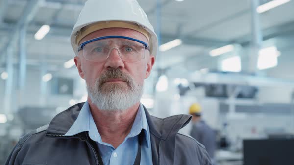 Close Up Portrait of a Middle Aged, Successful Male Engineer in White ...