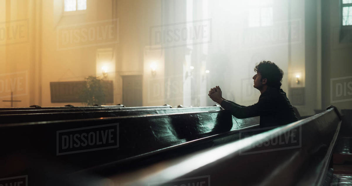 In A Grand Old Church, A Devout Christian Sits, finding Comfort in ...