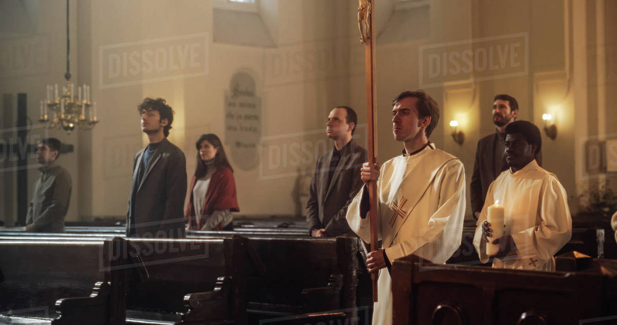 Ministers Carrying A Processional Cross, Begin The Grand Church's ...