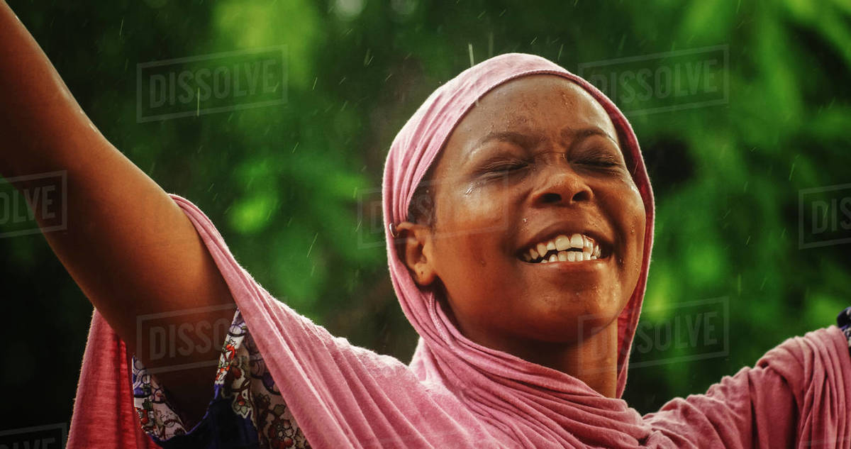 Portrait of an African Woman From a Rural Village with a Blurry ...