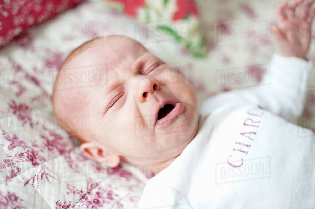 Close-up of crying baby - Royalty-free Stock Photo | Dissolve