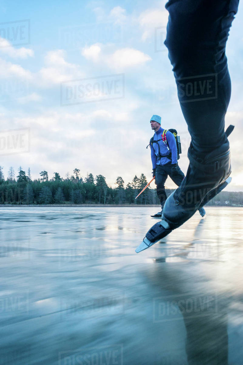 People long-distance skating - Stock Photo - Dissolve