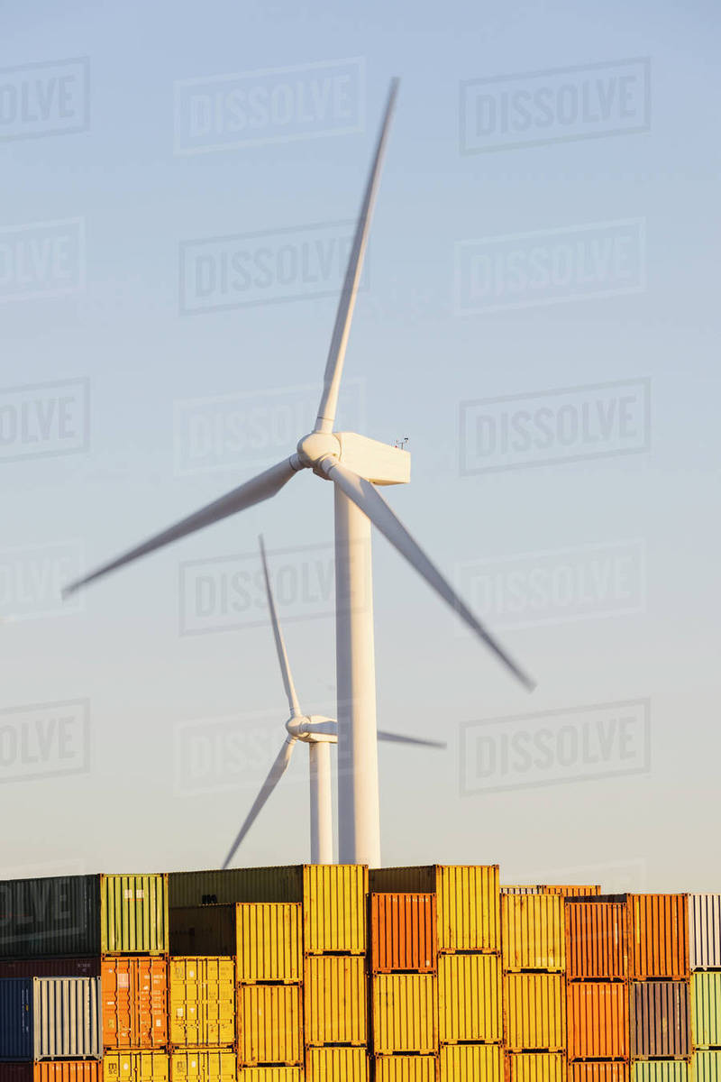 Wind turbines, cargo containers on foreground - Royalty-free Stock ...