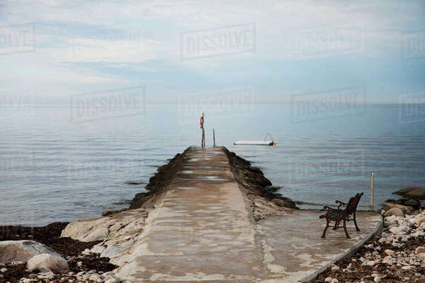 Empty jetty at sea - Royalty-free Stock Photo | Dissolve