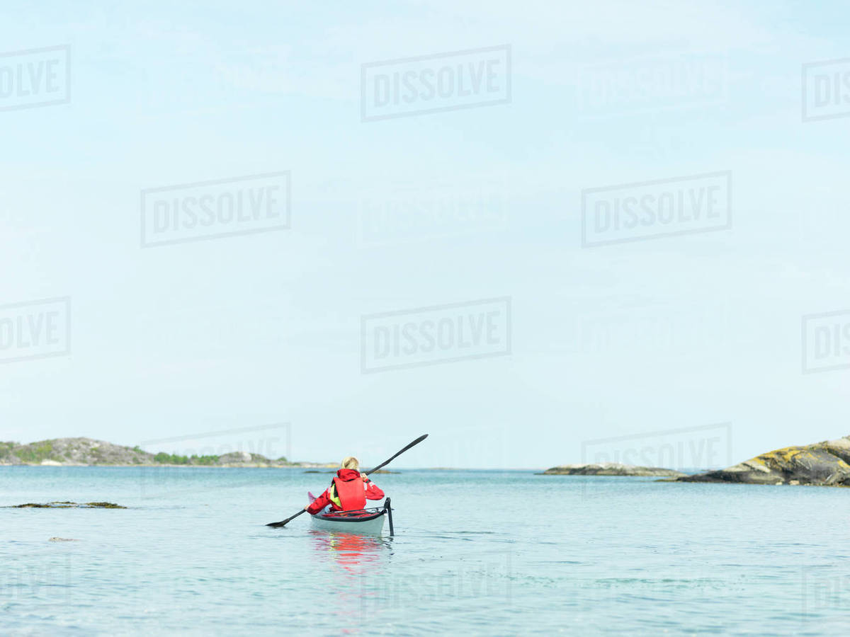 Person kayaking - Royalty-free Stock Photo | Dissolve