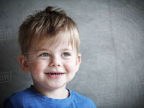 Portrait of smiling boy - Royalty-free Stock Photo | Dissolve