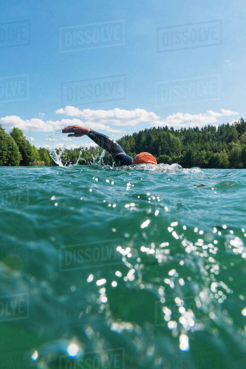 Person swimming - Royalty-free Stock Photo | Dissolve