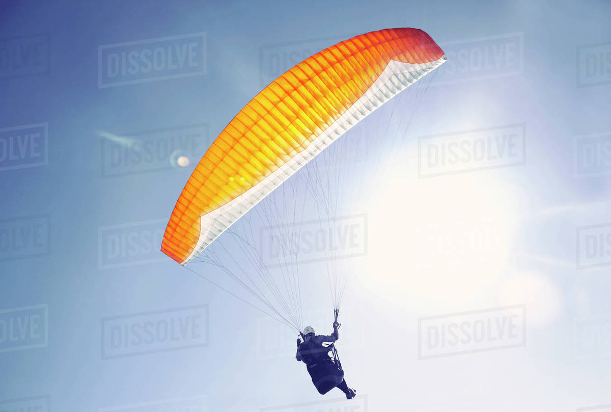 Person parachuting - Royalty-free Stock Photo | Dissolve
