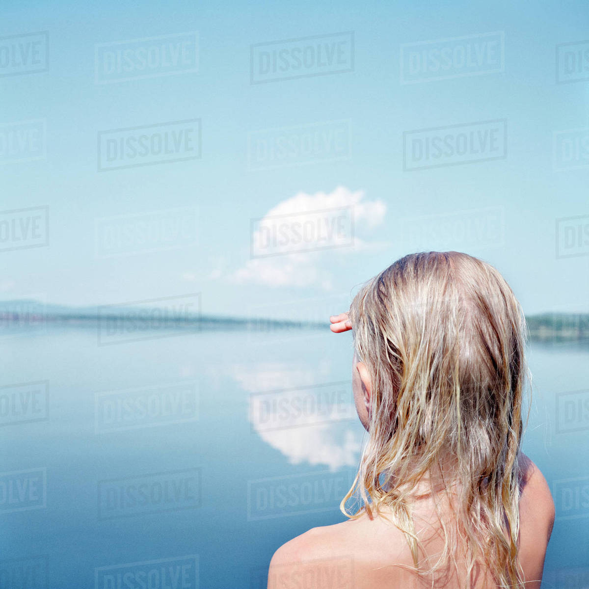 Girl looking at water - Royalty-free Stock Photo | Dissolve