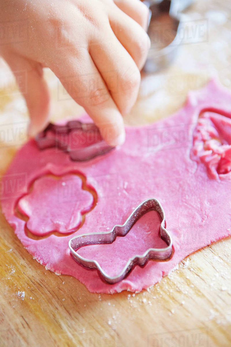Child making cookies - Royalty-free Stock Photo | Dissolve