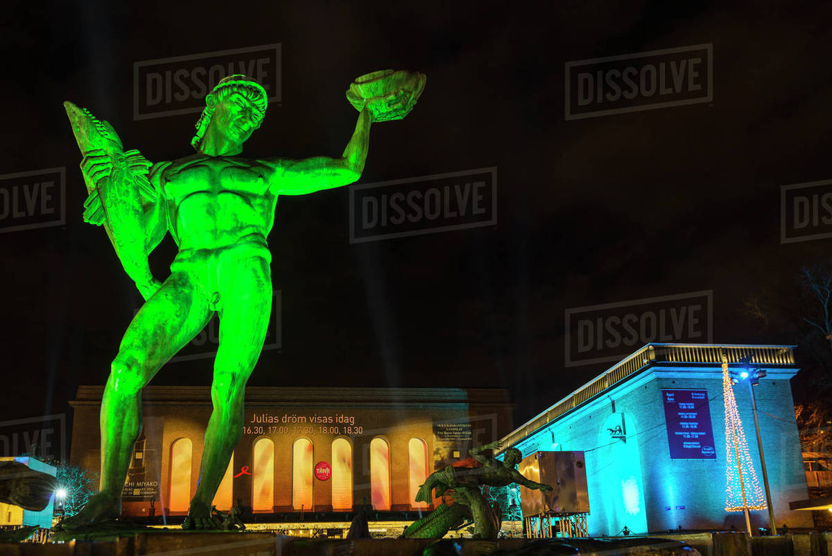Illuminated statue at night - Royalty-free Stock Photo | Dissolve