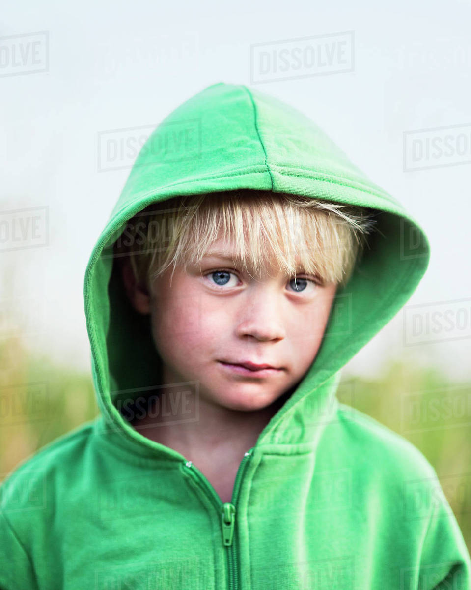Portrait of boy looking at camera - Royalty-free Stock Photo | Dissolve