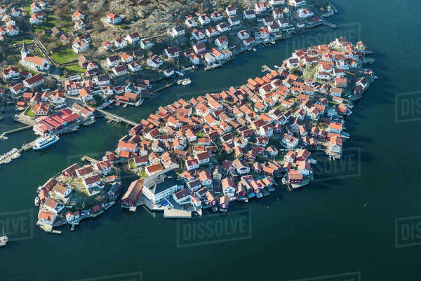 Aerial view of buildings at sea - Stock Photo - Dissolve