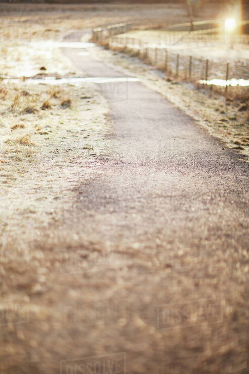 Empty dirt road - Royalty-free Stock Photo | Dissolve