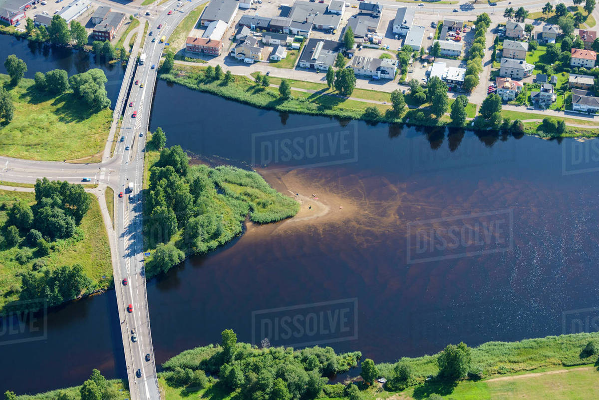 Aerial view of river flowing through city - Stock Photo - Dissolve