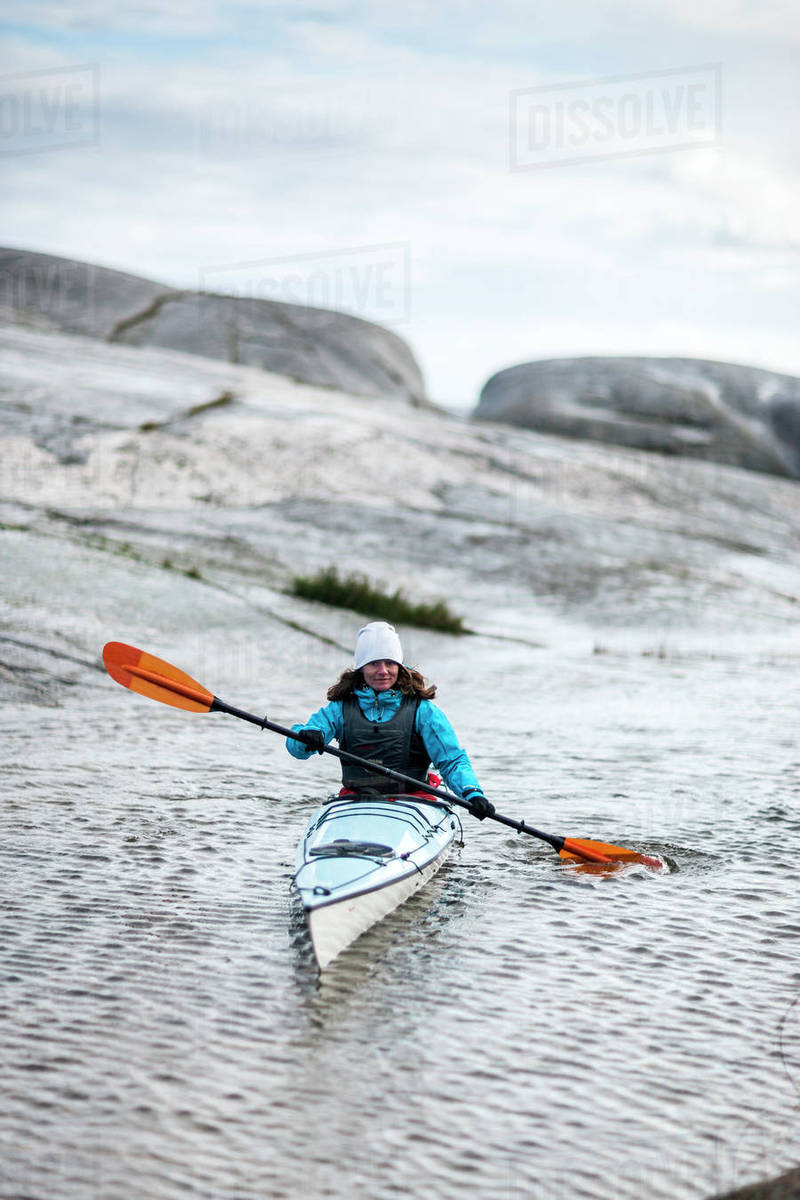Woman kayaking - Royalty-free Stock Photo | Dissolve