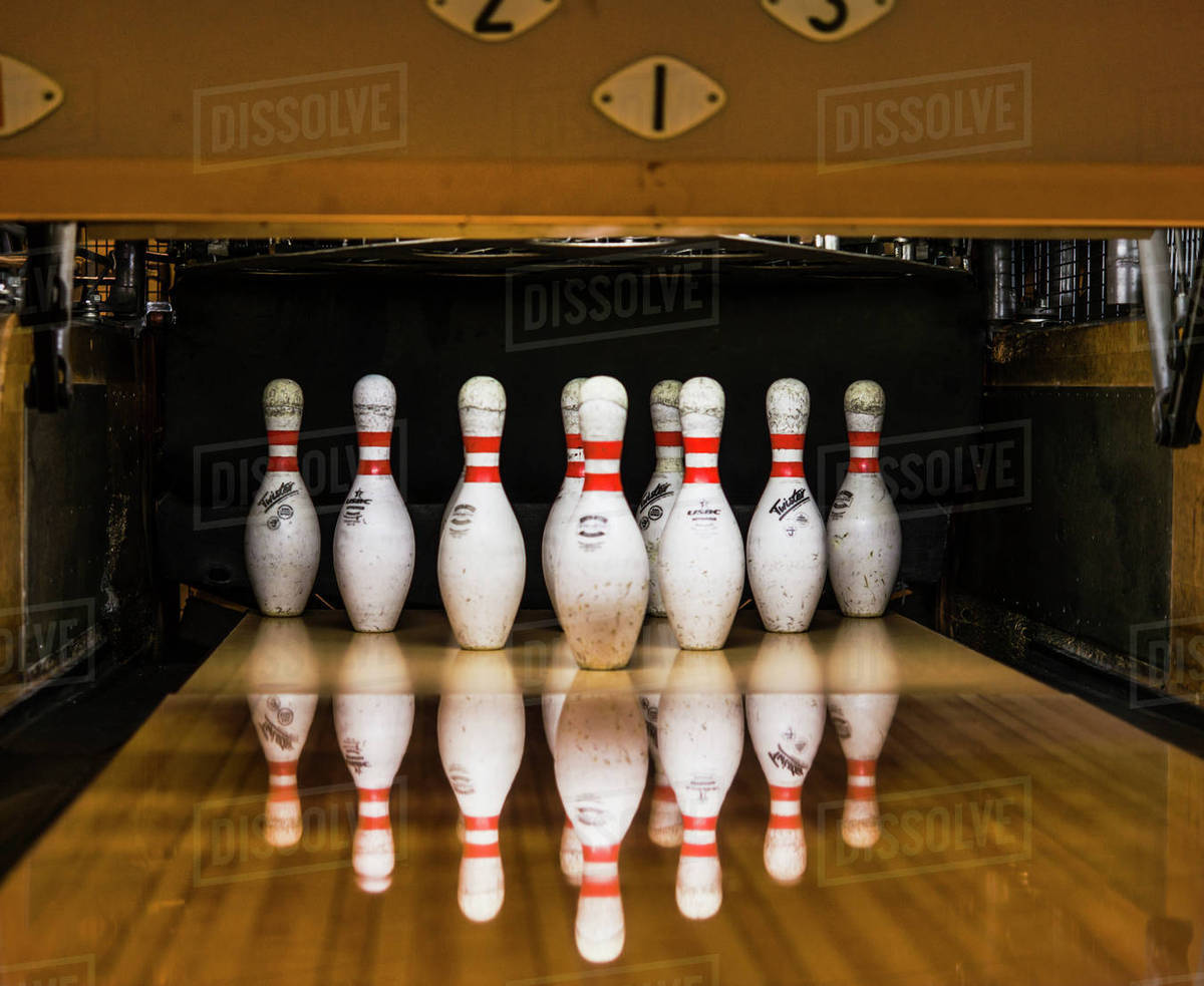 Bowling pins in row - Stock Photo - Dissolve