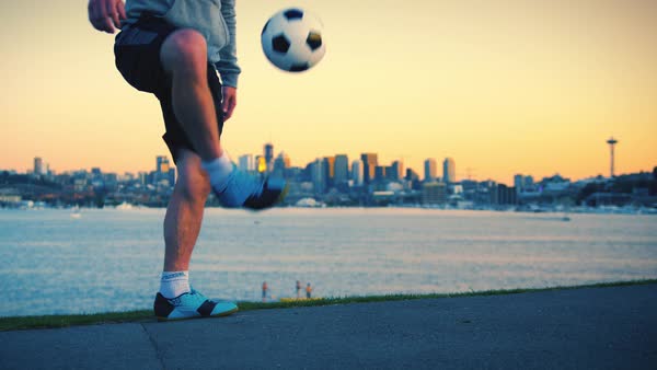 Stylized Slow Motion Soccer Ball Juggle with Seattle City Sunset - 4K ...