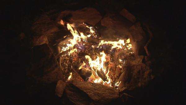 Topview of blazing and only slightly burning bonfire - Stock Video ...