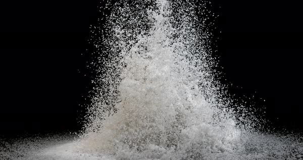Coconut, cocos nucifera, Powder Exploding against Black Background ...