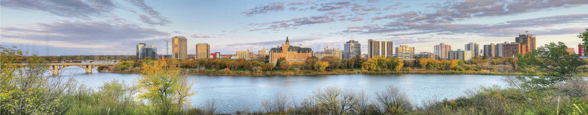 A Panorama view of Saskatoon, Canada cityscape over river - Royalty ...