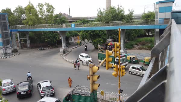 Delhi, India - 29th August 2019: Tilt up from view of busy road ...