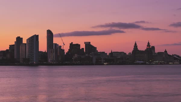 Liverpool skyline silhouette at sunrise from mersey river - Stock Video ...