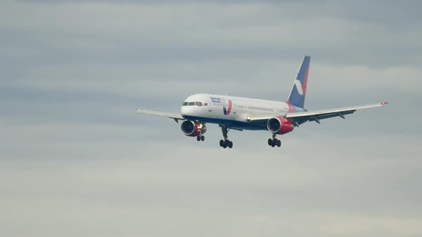 PHUKET, THAILAND: Passenger jet plane of Azur Air landing at Phuket ...