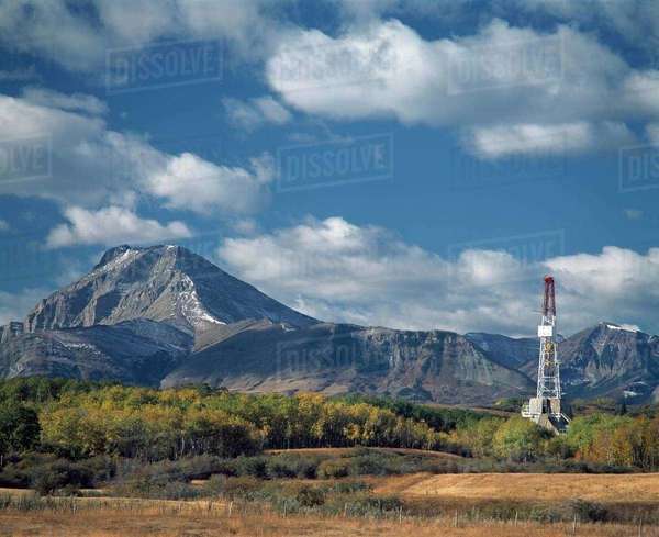 Oil Rig In The Mountains - Stock Photo - Dissolve