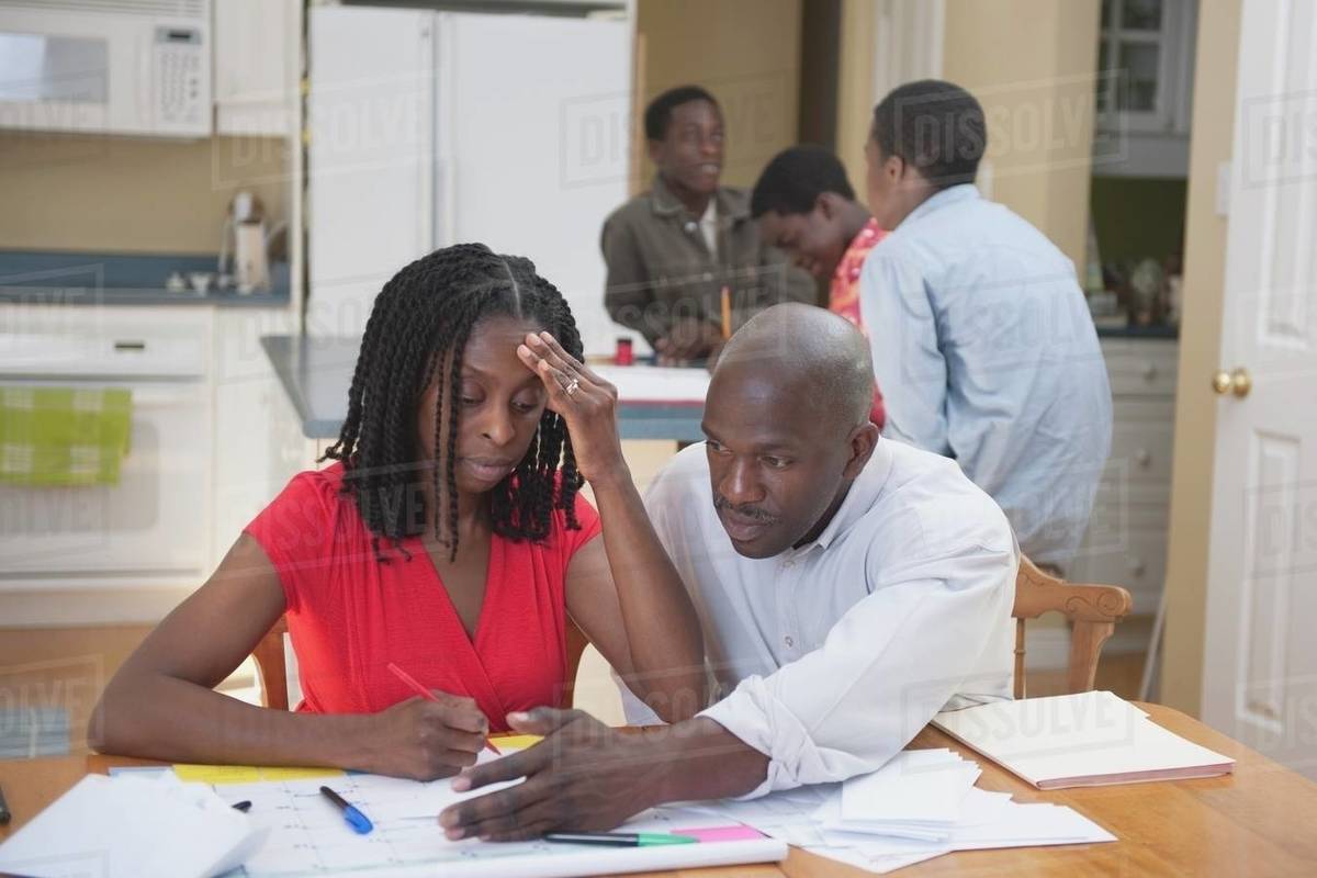 Stressed Parents Trying To Figure Out The Household Bills - Stock Photo ...