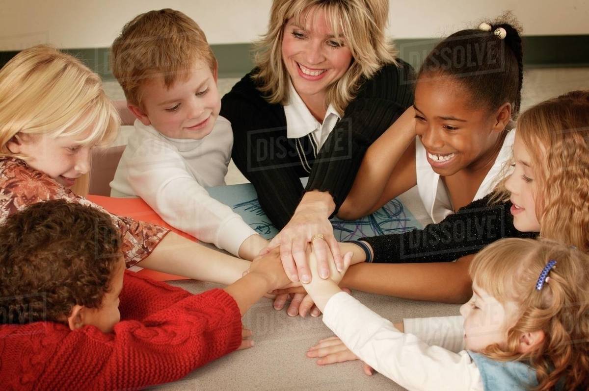 A Group Of Children With Teacher - Stock Photo - Dissolve