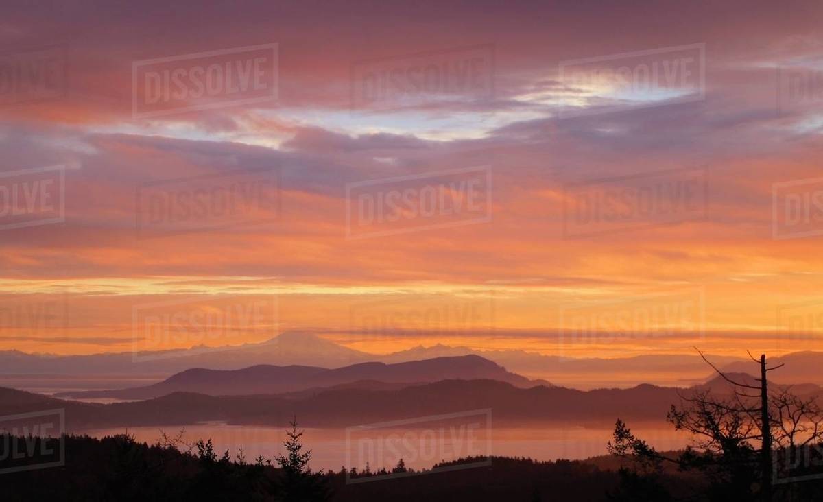 Sunset Through Clouds - Royalty-free Stock Photo | Dissolve