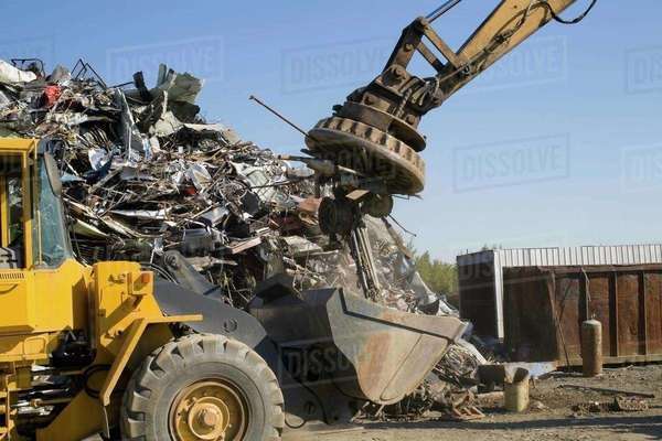 Items Being Pulled Off A Pile Of Materials For Recycling - Royalty-free ...