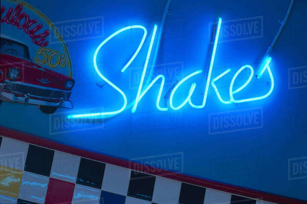 Neon Sign In 50's Style Diner - Stock Photo - Dissolve
