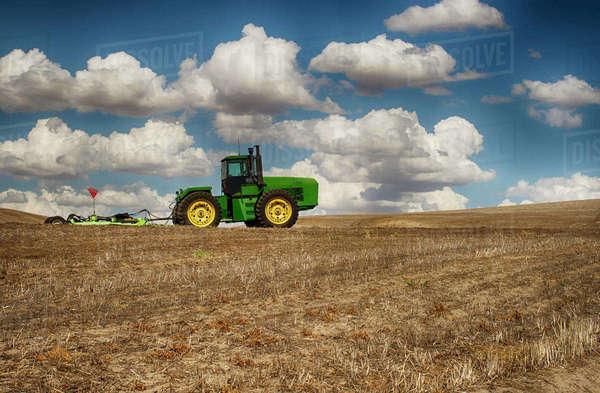 Tractor In A Wheat Field; Palouse, Washington, United States Of America ...