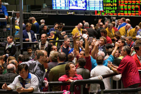 Agriculture - Commodities traders working on the interior trading floor ...