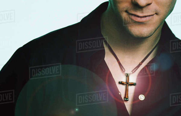 Man Wearing Cross - Royalty-free Stock Photo | Dissolve