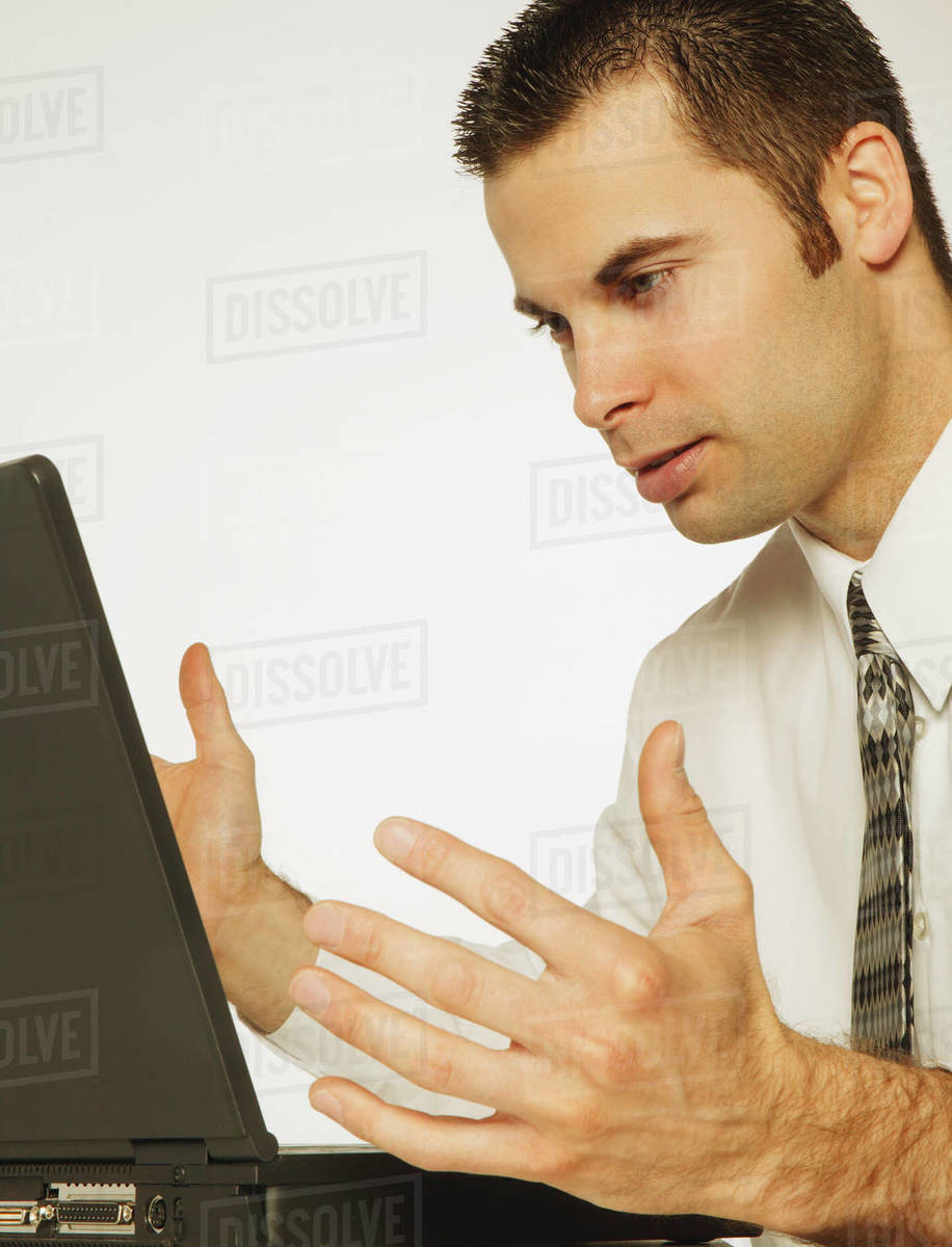 Businessman In Confusion - Royalty-free Stock Photo | Dissolve