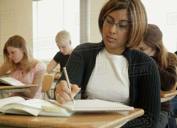 Students Doing An Assignment - Royalty-free Stock Photo | Dissolve