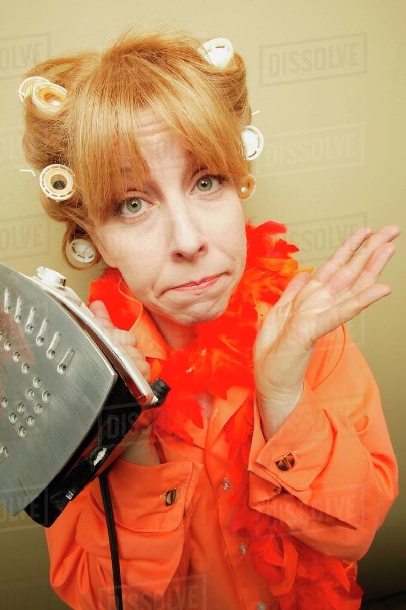 Woman With An Iron - Royalty-free Stock Photo | Dissolve