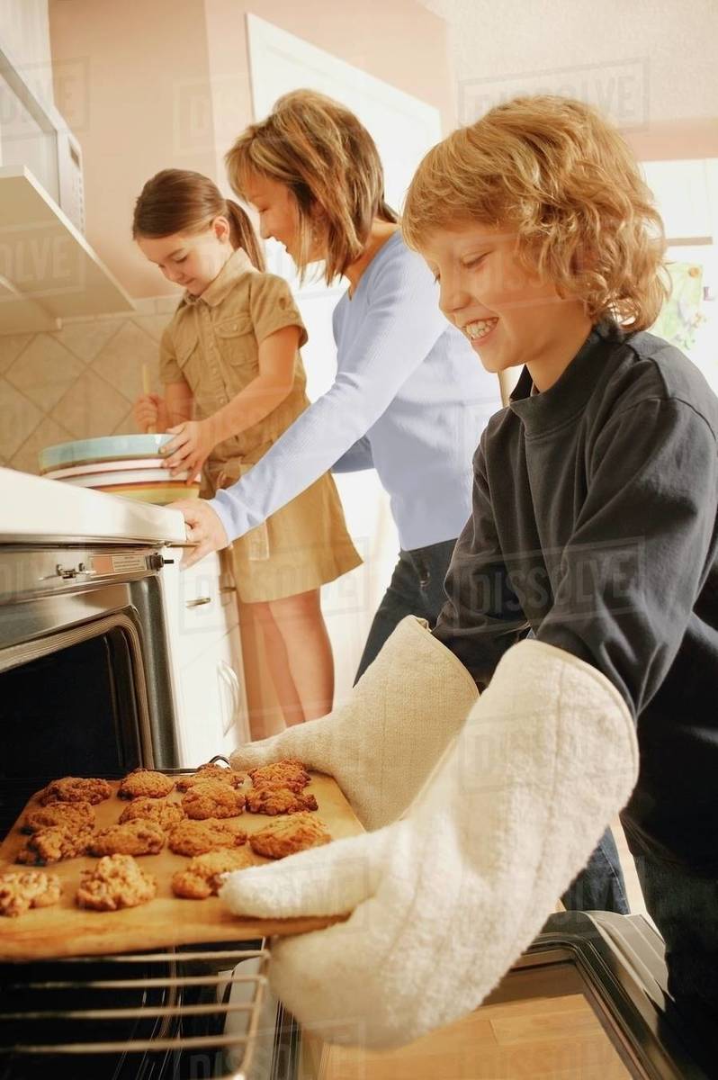 Children Helping To Bake Cookies - Royalty-free Stock Photo | Dissolve