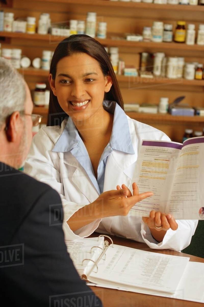 Pharmacist Giving Patient Medical Advice - Royalty-free Stock Photo ...