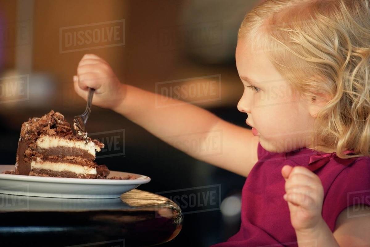 Child Eating Cake - Royalty-free Stock Photo | Dissolve