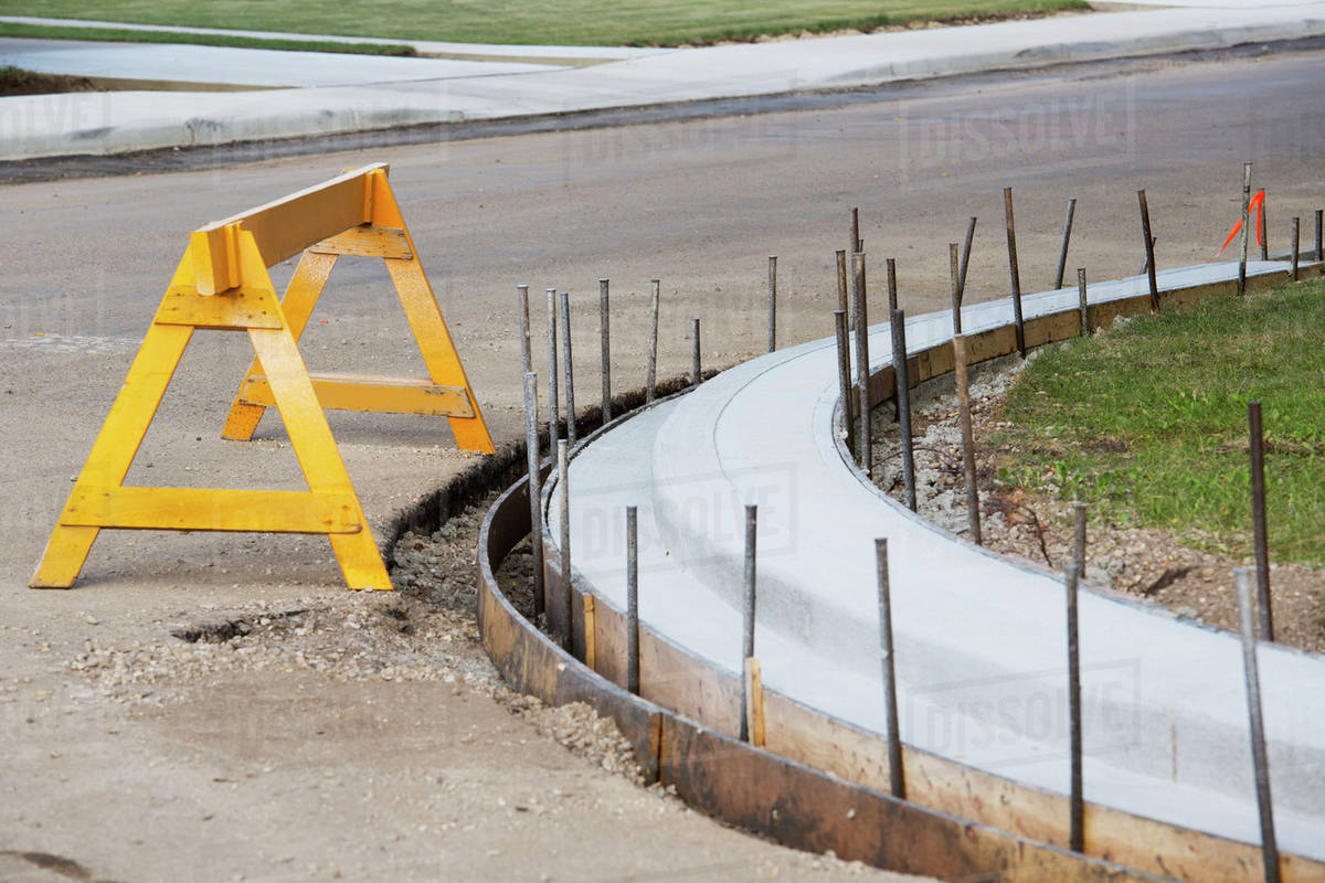 New curb installation on roadway; Edmonton, Alberta, Canada - Royalty ...