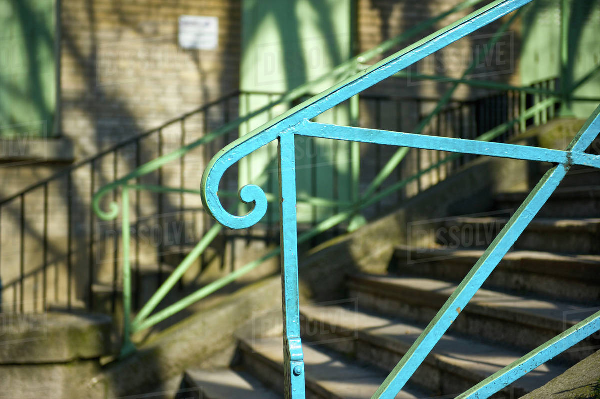 A blue painted metal railing and handrail; Paris, France - Royalty-free ...