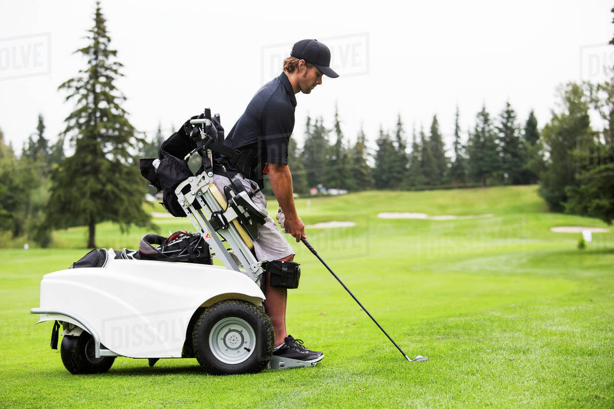 Disabled golfer in a tournament using high tech mobility aid; Edmonton ...