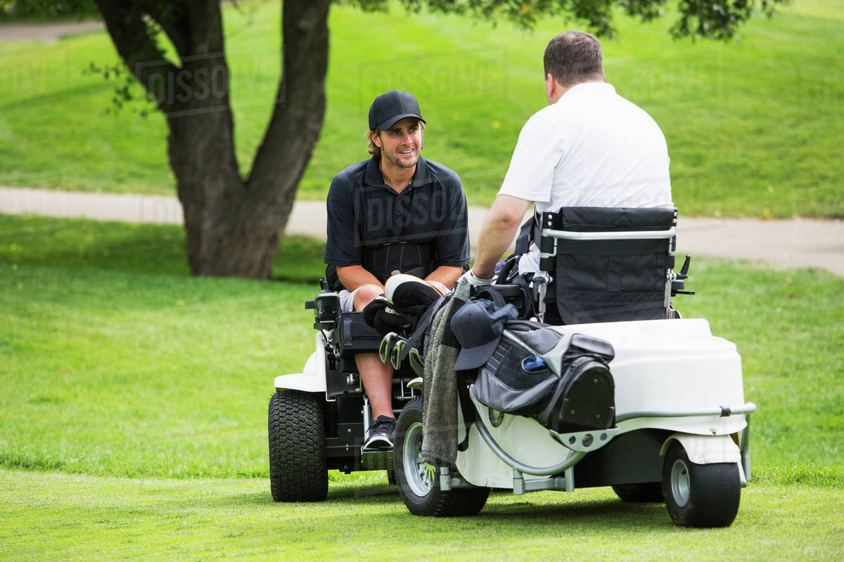 Disabled golfer in a tournament using high tech mobility aid; Edmonton ...