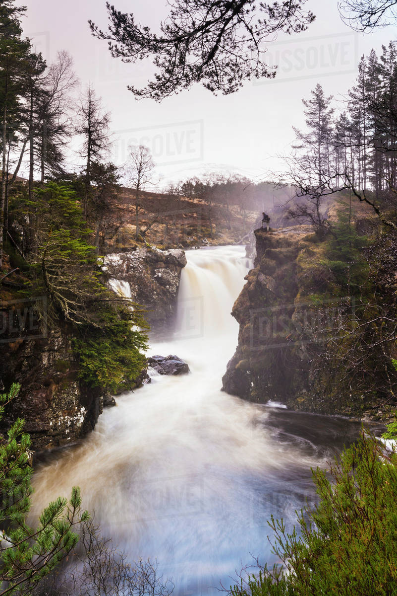 Man looking over The Falls of Pattack on the Ardverikie Estate, near ...