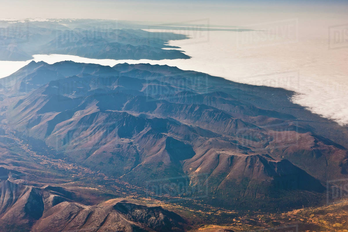 Aerial View Of The Chugach Mountains And Fog Covering Cook Inlet And ...