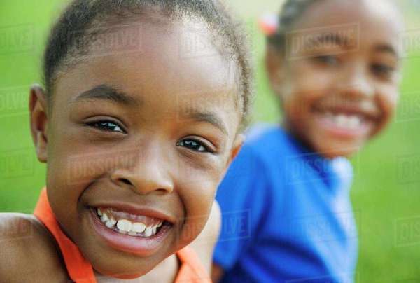 Two Girls Smiling - Royalty-free Stock Photo | Dissolve